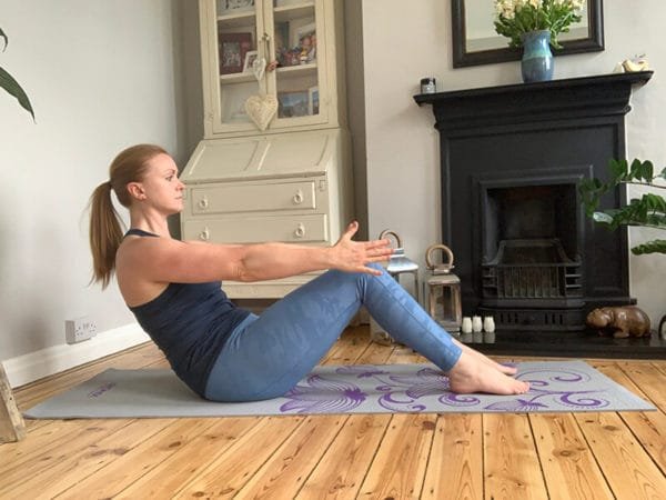 Pilates Roll Up Exercise: How to do a Pilates Roll Up + Benefits and ...