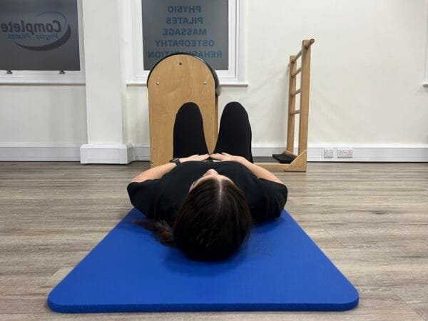Bent knee opening Pilates Exercise - here’s how to do it - Complete Pilates